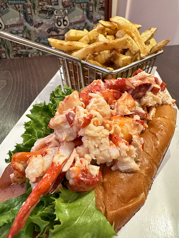 Maine's ocean bounty overflows in this lobster roll &ndash; sweet, tender chunks barely contained by a perfectly toasted bun and fresh lettuce.