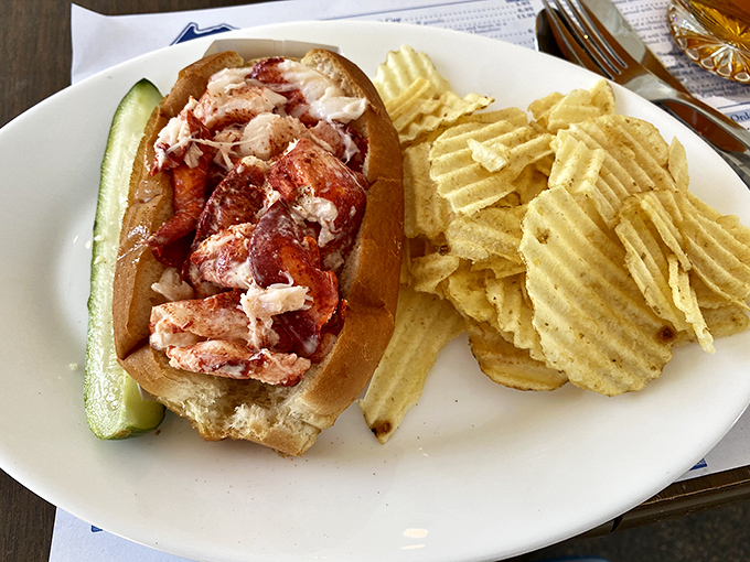 This isn't just a lobster roll &ndash; it's Maine's maritime treasure, nestled in a perfectly toasted bun with just enough mayo to let the sweet meat shine.
