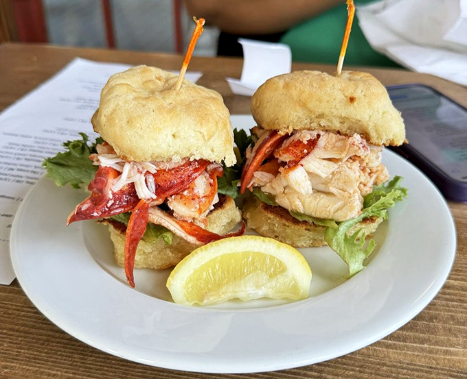 These aren't just lobster rolls &ndash; they're edible works of art. Sweet lobster meat nestled in golden buttermilk biscuits creates two perfect bites of heaven.