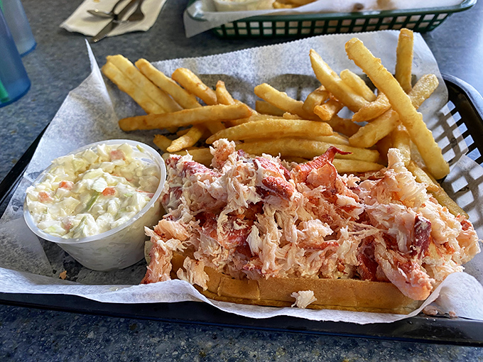 A perfect Maine lobster roll doesn't need fancy frills &ndash; just sweet, chunky meat, a buttered bun, and golden fries.
