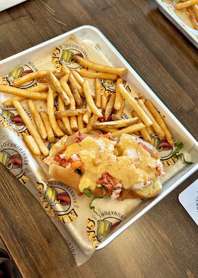 The dynamic duo: a lobster roll that could make a mermaid jealous, paired with fries crispier than New England fall leaves.