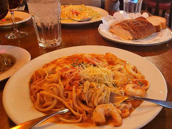 Behold the Chicken Parmigiana in all its golden, cheese-covered glory, looking like it just won best in show at the breaded poultry competition.