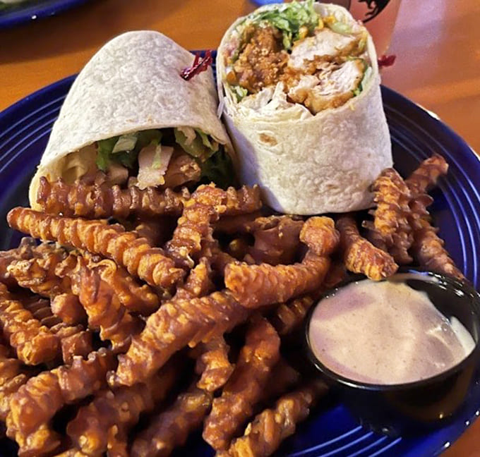That Buffalo Chicken Wrap paired with waffle fries is basically the dynamic duo of deliciousness, Batman and Robin style.
