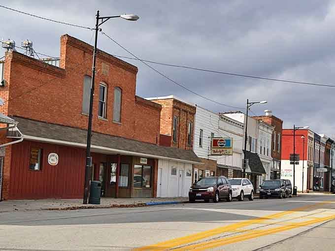 Main Street: Brick storefronts with character earned through decades stand shoulder to shoulder, housing businesses where your name matters more than your credit score.