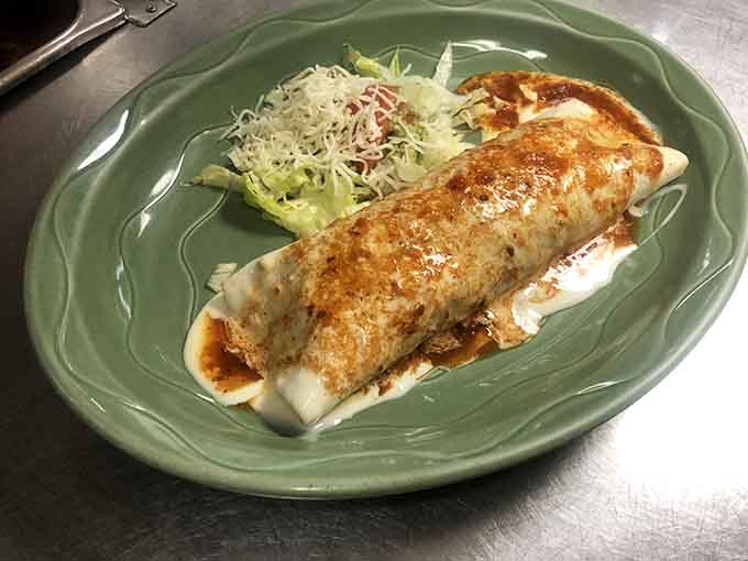 This golden burrito arrives like a delicious torpedo of happiness, perfectly grilled and ready to change your entire perspective on Mexican food in Minnesota.