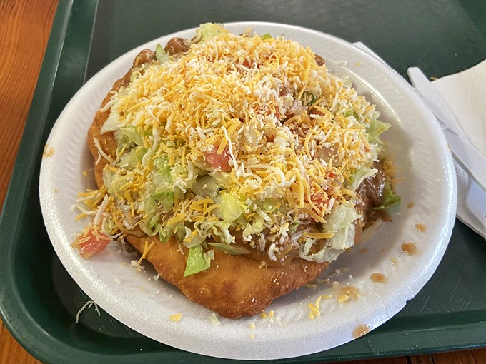 Behold the legendary Navajo taco in all its glory &ndash; a mountain of savory toppings piled high on golden fry bread that's worth every mile of the journey.