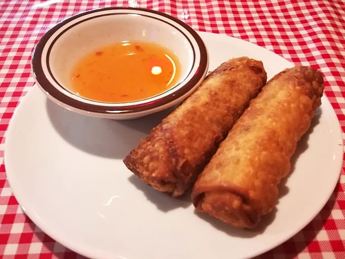 Golden, crispy, and perfectly fried, these egg rolls are just the beginning of your flavor journey.