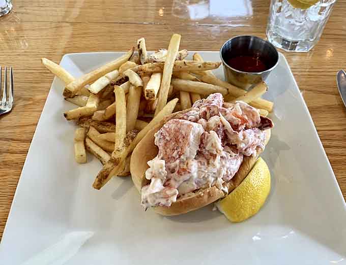 That lobster roll is no joke, overflowing with fresh meat on a perfectly toasted bun that dreams are made of.