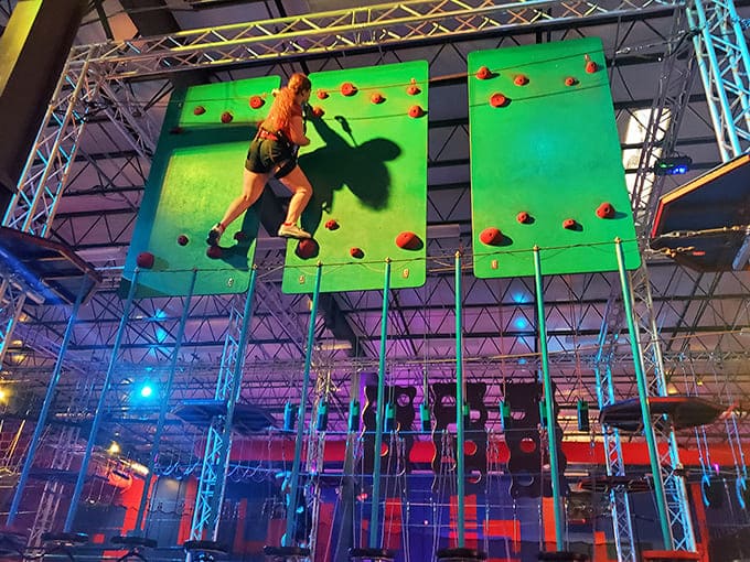 The climbing wall challenges adventurers of all ages to reach new heights while safety harnesses ensure the only thing falling is inhibition.