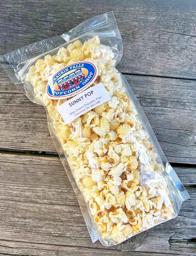 Each translucent bag reveals golden kernels transformed into clouds of perfection &ndash; the "Sunny Pop" combines Ohio sweet corn flavor with coconut oil magic.