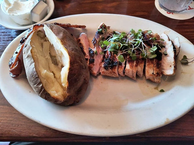 Behold the legend: perfectly grilled pork steak with that coveted pink center and balsamic Brussels sprouts stealing the show.