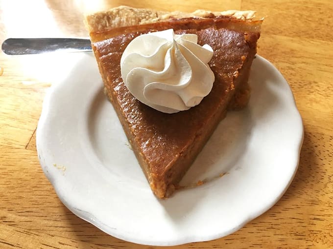 Pumpkin pie with a cloud of whipped cream, because sometimes simple perfection needs no introduction or apology.