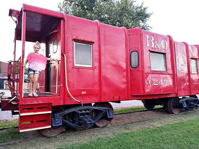 All aboard the nostalgia express! This vibrant red B&O caboose invites explorers of all ages to experience railroad history firsthand.