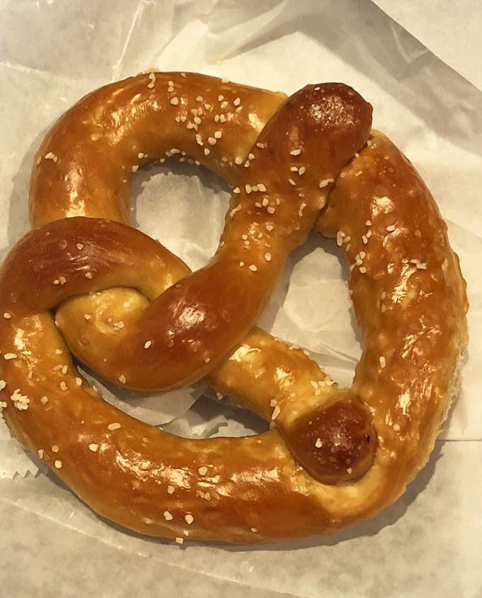 Behold the pretzel in its natural habitat: golden, salted, twisted into submission, and ready to make your day infinitely better.