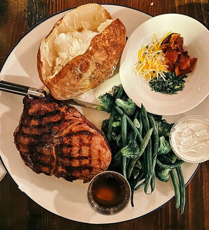 A masterclass in steak perfection &ndash; charred exterior, tender interior, accompanied by vibrant vegetables that actually taste like vegetables should.