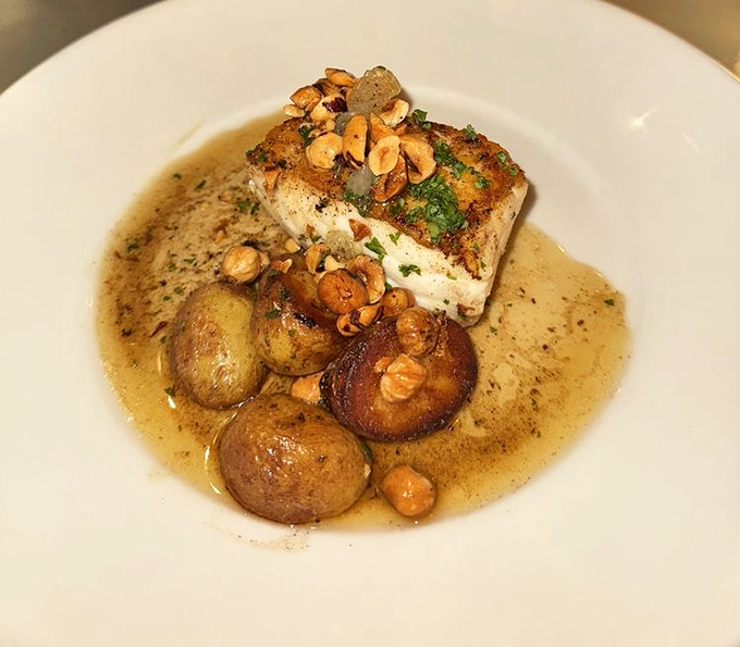 This isn't just halibut; it's a masterclass in restraint &ndash; perfectly roasted fish with potatoes bathed in a sauce worth bottling.