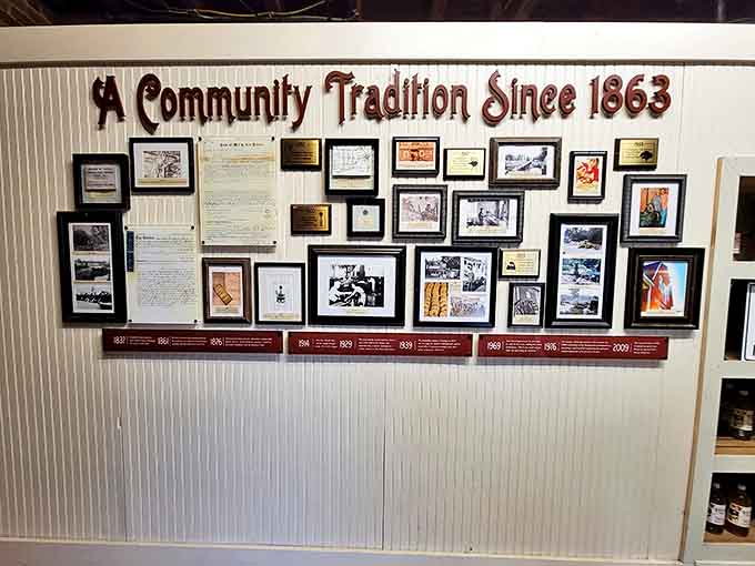 Wall Decoration: A visual timeline showcases Yates' journey through American history &ndash; from horse-drawn wagons to Instagram posts, all centered around apples.