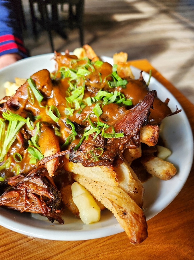Short Rib Poutine that'll make Canadians jealous &ndash; tender braised meat atop crispy fries creates comfort food with a tropical passport.