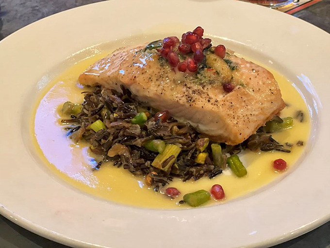 Behold the stuffed salmon in all its glory, nestled on wild rice like edible treasure from the deep.