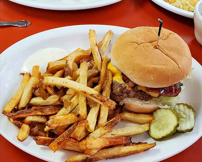 That burger and fries combo proves lunch here is no joke: crispy, golden, and exactly what you need mid-adventure.