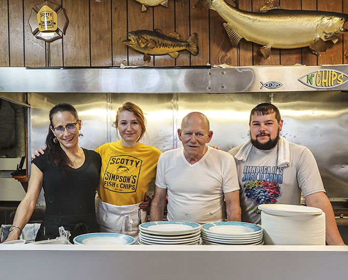 Meet the dream team behind Detroit's crispiest catch. They're not just staff, they're the guardians of golden goodness!