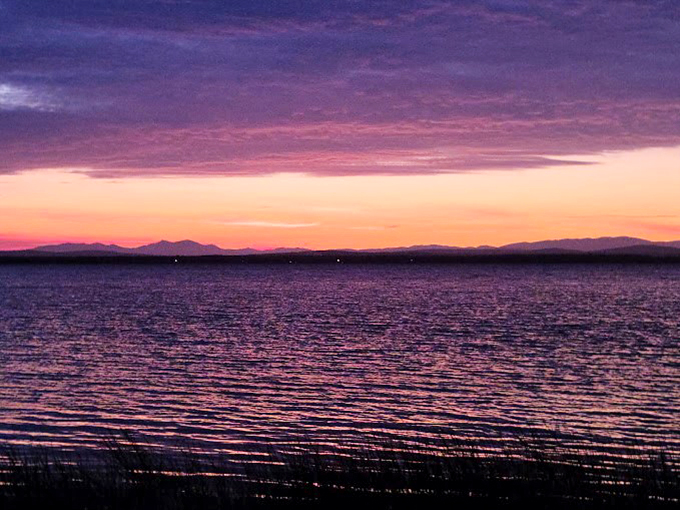 Mother Nature's evening show across Lake Champlain&mdash;no tickets required, standing ovations happen naturally.