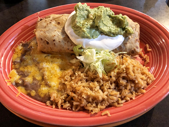 A fiesta on a plate! The combination platter showcases Guayo's greatest hits &ndash; a perfectly stuffed burrito alongside Spanish rice that's never an afterthought.