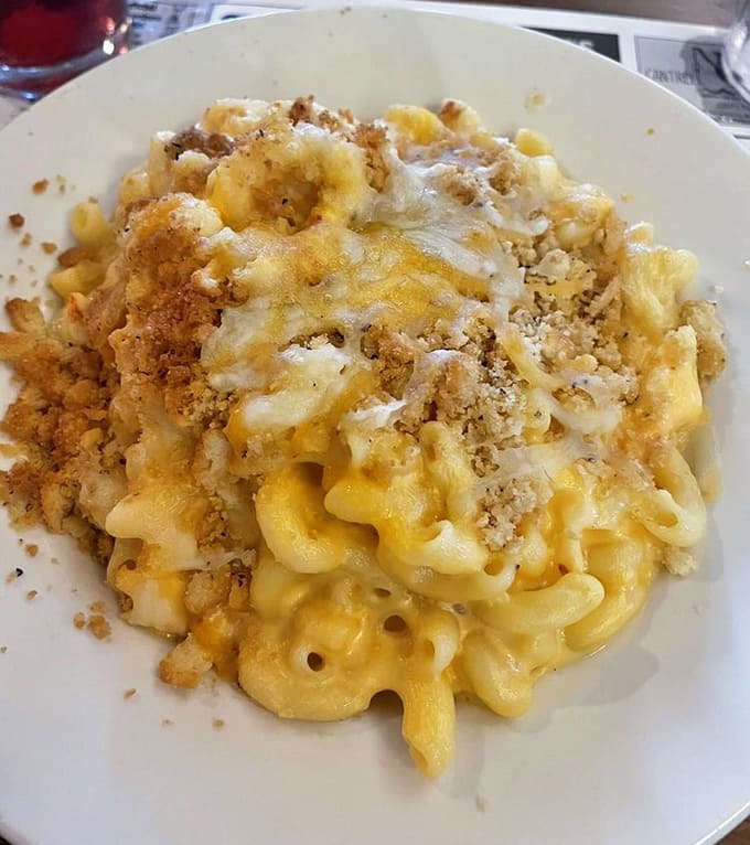 This lobster mac and cheese looks like comfort food went to heaven and came back with a Maine accent and serious ambitions.