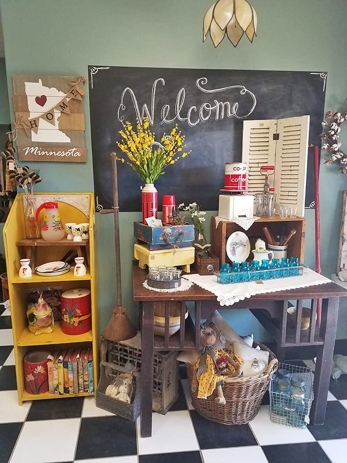 That chalkboard welcome feels like walking into a friend's home, if your friend happened to have impeccable taste in vintage decor.