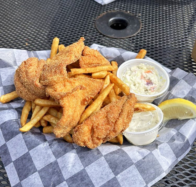 Golden, crispy perfection meets flaky tenderness in this basket, proving that sometimes simple really is the most spectacular option available.