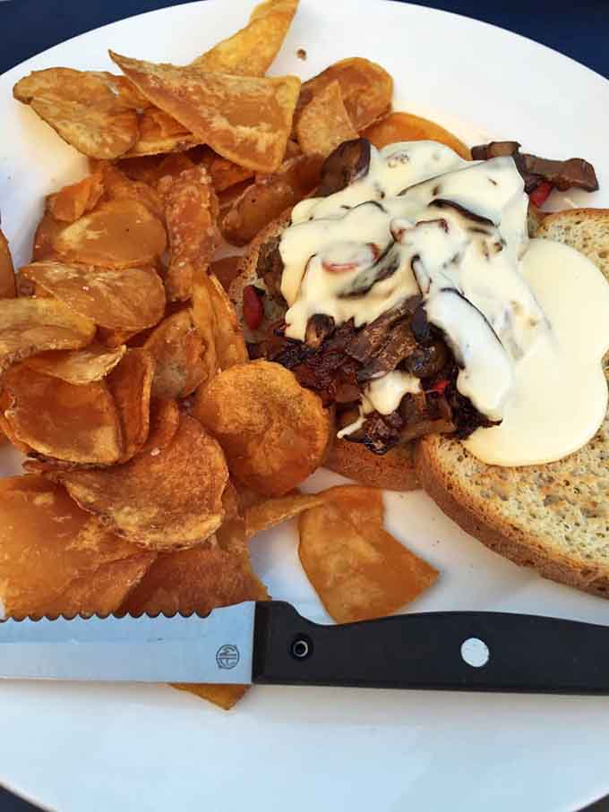 The Bison Philly in all its glory: wild rice meatballs, smoked gouda sauce, and vegetables that actually taste good.