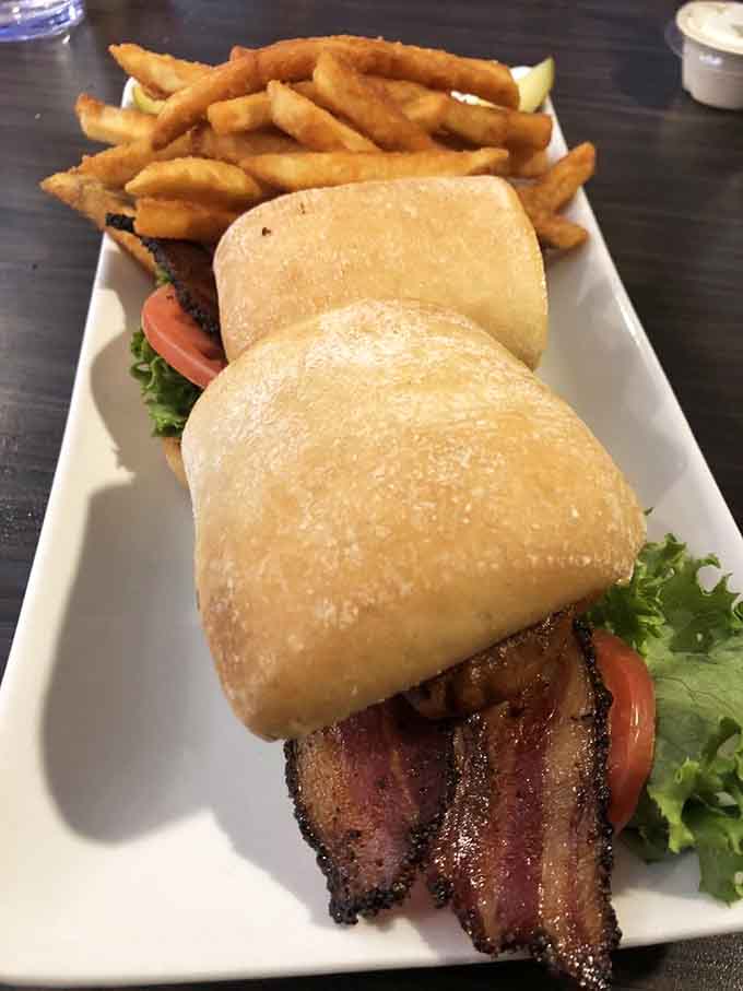 Behold the Walleye BLT in all its glory, a towering creation that makes other sandwiches look like they're not even trying.