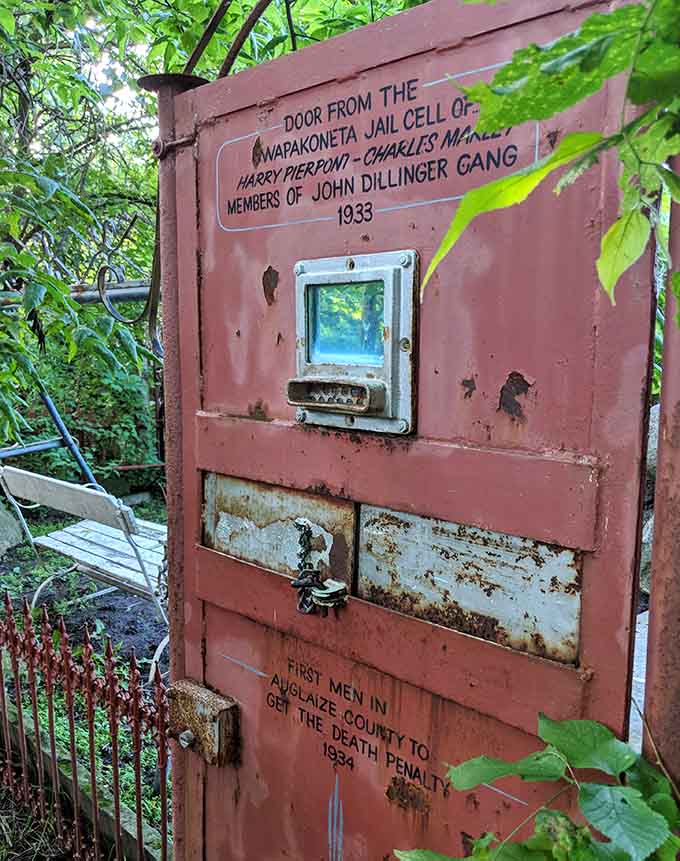 Nothing says "reformed justice system" quite like turning a jail cell door into garden art, complete with its own criminal pedigree and stories to tell.