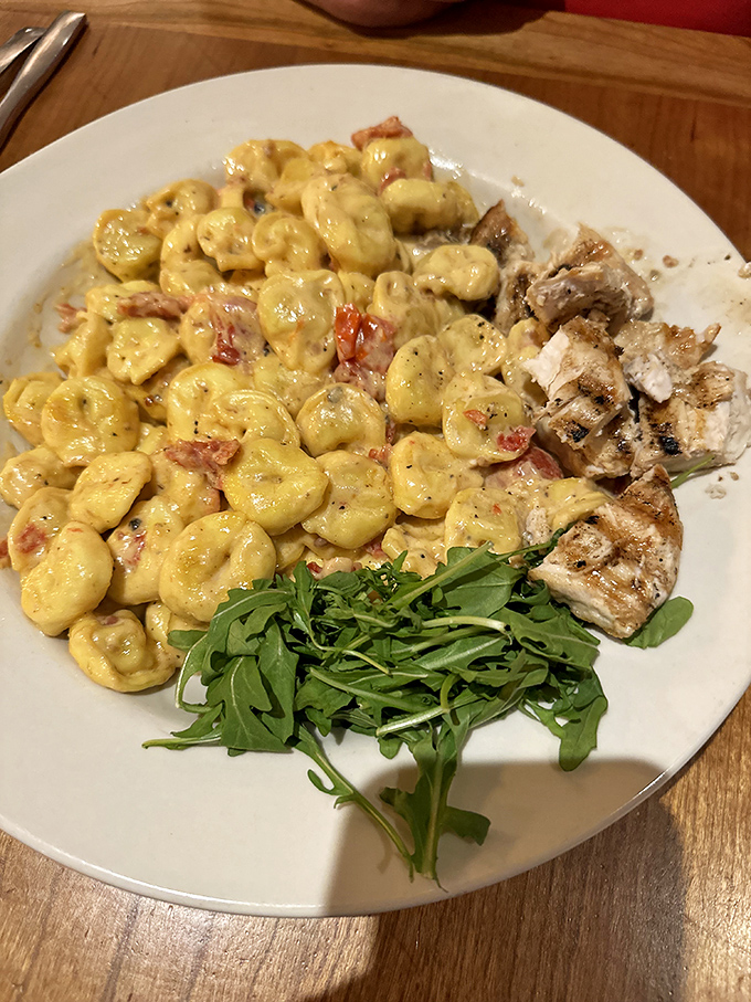 Tortellini that doesn't just sit on the plate but performs a cheesy tango with sun-dried tomatoes, making pasta night something to celebrate.
