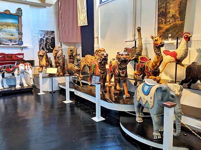 A menagerie frozen in time &ndash; these magnificent beasts showcase the golden age of carousel craftsmanship with their fierce expressions and detailed saddles.