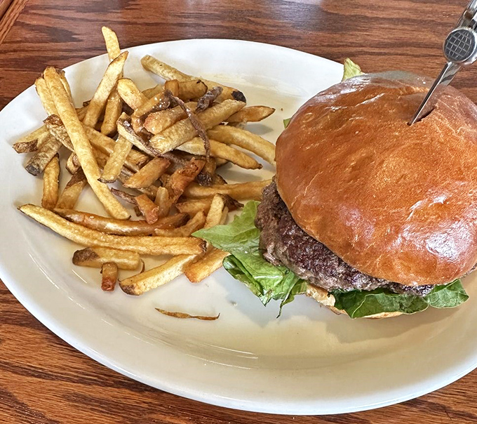 The signature Vinaio burger arrives like a work of art – juicy perfection on a toasted bun with those addictive house-cut garlic fries.