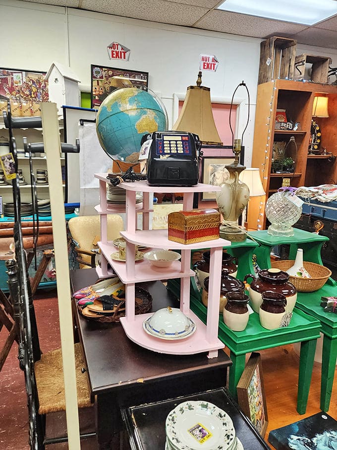 Vintage globes and pink shelving create the perfect backdrop for time travelers seeking that "just right" conversation piece for their modern homes.