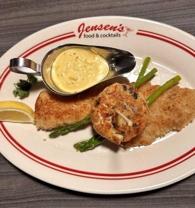 Walleye Oscar&mdash;where Canadian walleye meets crab cake in a romance chaperoned by b&eacute;arnaise sauce. This isn't just dinner; it's a culinary fairy tale with a happily-ever-after finish.