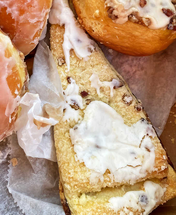 Walnut Danish: Flaky, buttery perfection spiraled with cinnamon-sugar coated nuts – worth every mile of the journey and every calorie consumed.