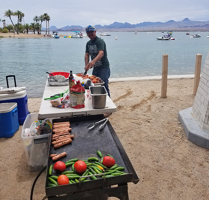 A grillmaster works his magic lakeside &ndash; because everything tastes better with a side of spectacular water views.
