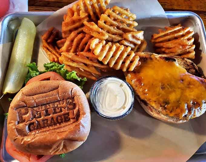This isn't just any burger &ndash; it's a Pete's Garage masterpiece, stamped with pride and served with waffle fries that'll make your regular fries jealous.