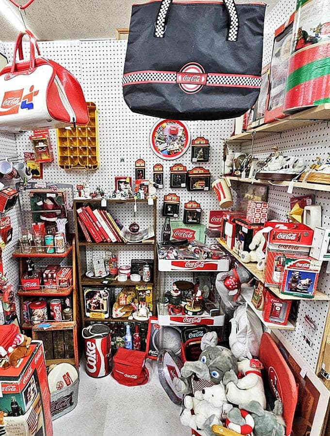 Coca-Cola paradise! This booth is what happens when someone turns their refreshing obsession into a collector's dream come true.