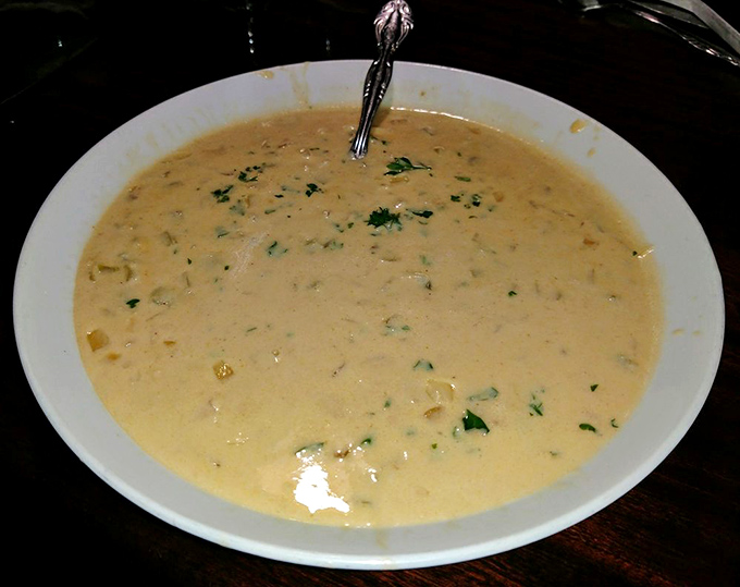 The legendary She Crab Soup &ndash; if comfort could be liquefied and served in a bowl, this velvety, crab-studded masterpiece would be it.