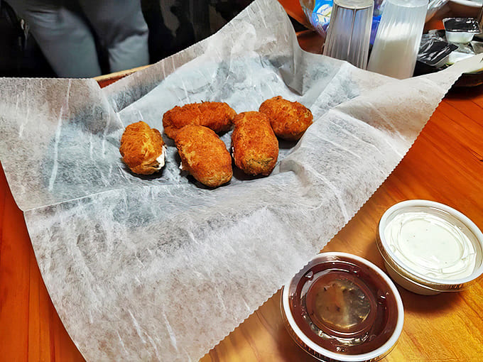 Crab Sticks: Golden-brown perfection with a creamy center &ndash; these aren't just appetizers, they're the reason some folks cross county lines with a gleam in their eye.