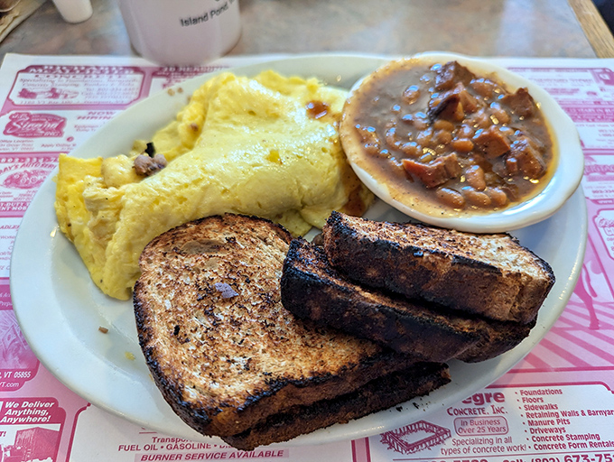 Breakfast perfection on a plate &ndash; fluffy eggs, perfectly browned toast, and beans that have simmered to flavor nirvana.