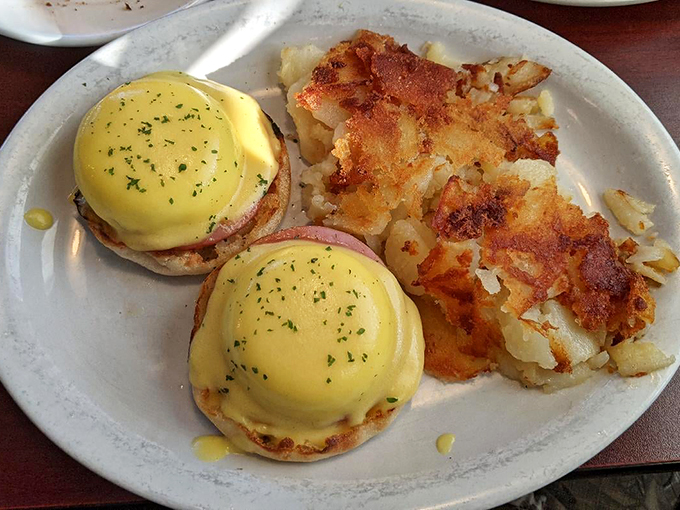 Hollandaise for days! These eggs Benedict are so perfectly poached, they'd make Julia Child weep with joy.