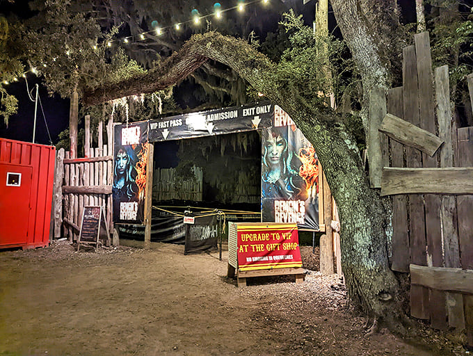 The entrance to Demon's Revenge lures visitors through an archway of twisted branches and disturbing imagery. No turning back now!