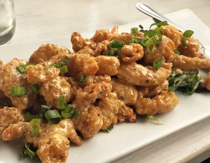 These aren't your average popcorn shrimp—they're the blockbuster hit of appetizers, ready to explode with flavor in your mouth. Boom!