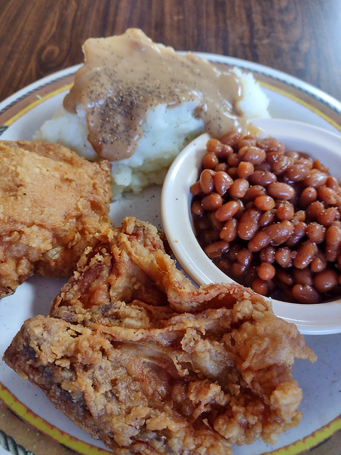 Golden-brown fried chicken that makes you want to write poetry &ndash; crispy exterior giving way to juicy meat that's worth every mile driven.