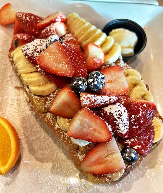 This isn't just French toast &ndash; it's a fruit-topped masterpiece that makes you wonder if breakfast has been holding out on you all these years.